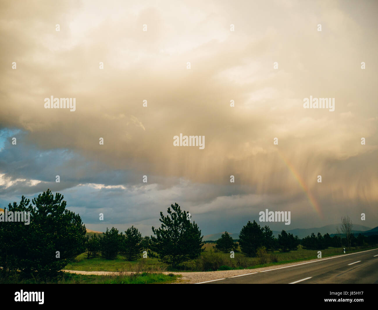 Rainbow over asphalt mountain hi-res stock photography and images - Alamy