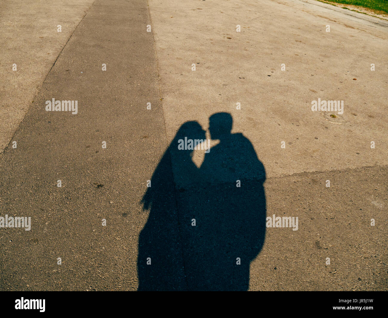 The shadow of the couple on the floor. Silhouette of the shadow of the ...