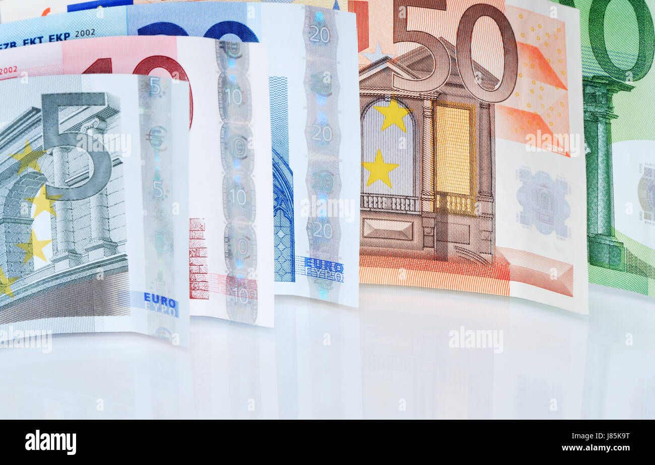 Few European bank notes standing on glass surface with reflection Stock ...