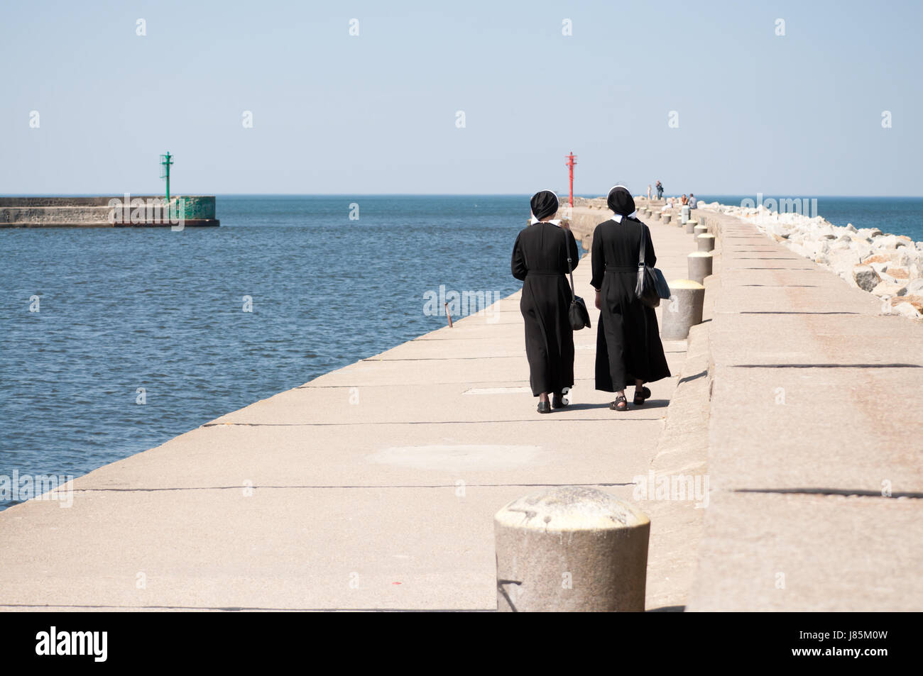 woman religion female beach seaside the beach seashore sister nun ...