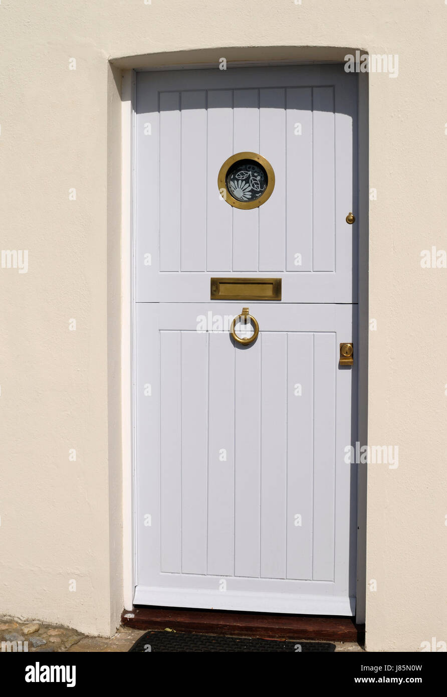 window porthole dormer window pane entrance door handle knocker ...