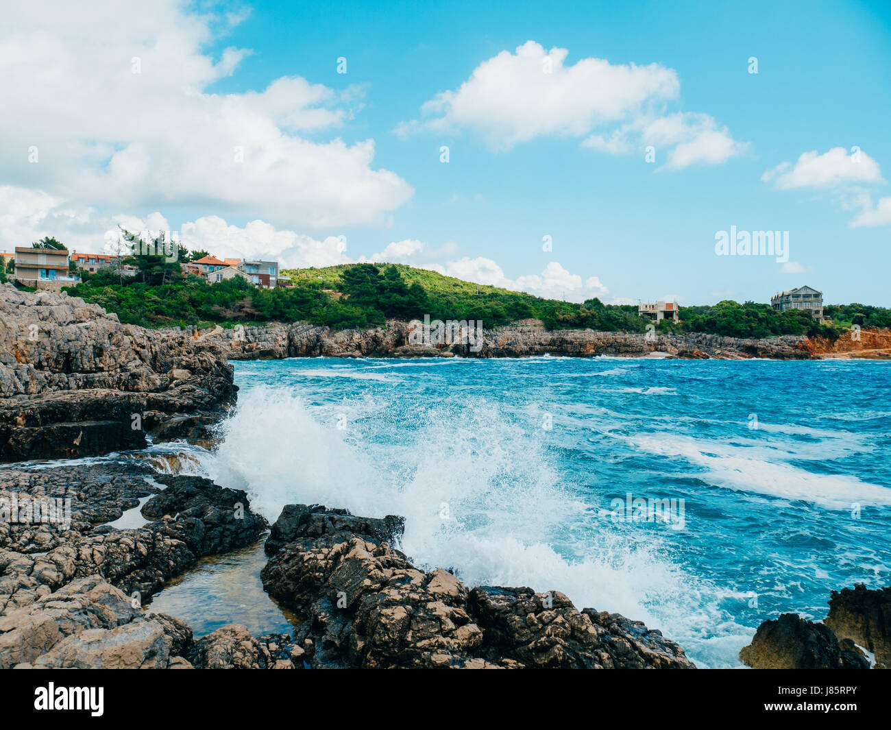 Rocks on the sea in Montenegro. Rocky coast. Wild beach. Dangerous ...