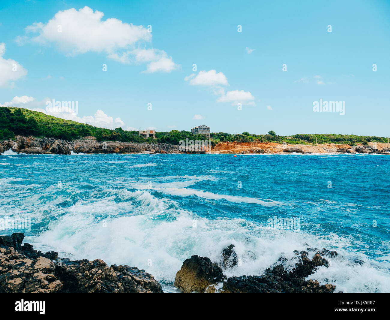 Rocks on the sea in Montenegro. Rocky coast. Wild beach. Dangerous ...