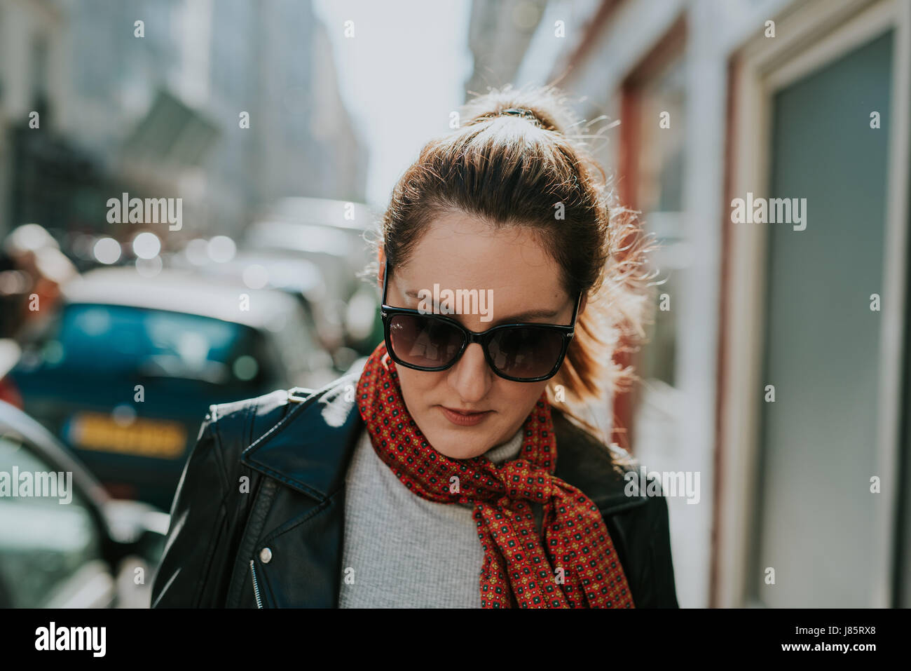 French woman walking on the streets of Paris Stock Photo - Alamy