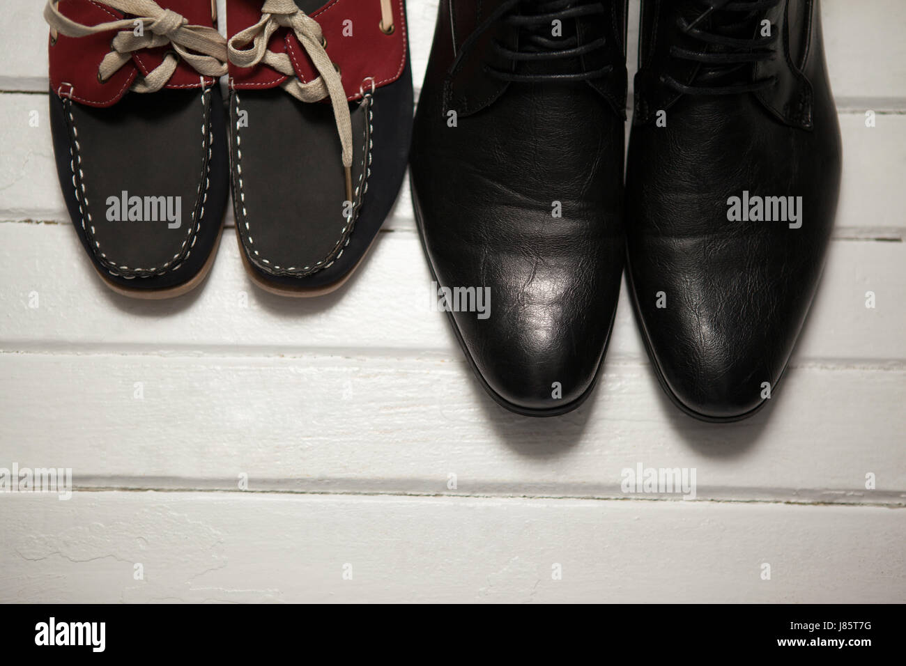 Overhead view of shoes on wooden floor Stock Photo - Alamy