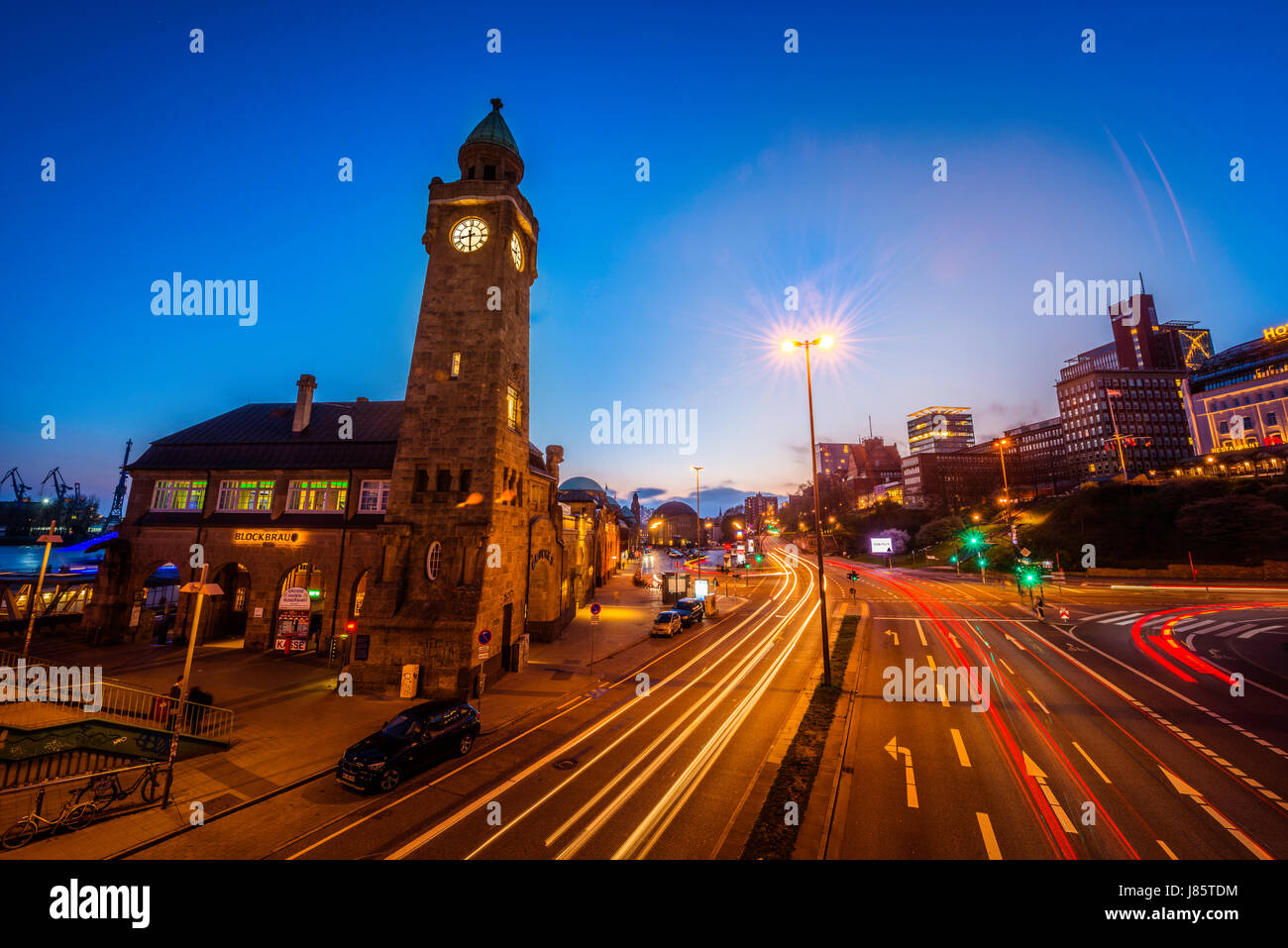 Clock tower, Gauging tower, St. Pauli landing stages with street, night ...