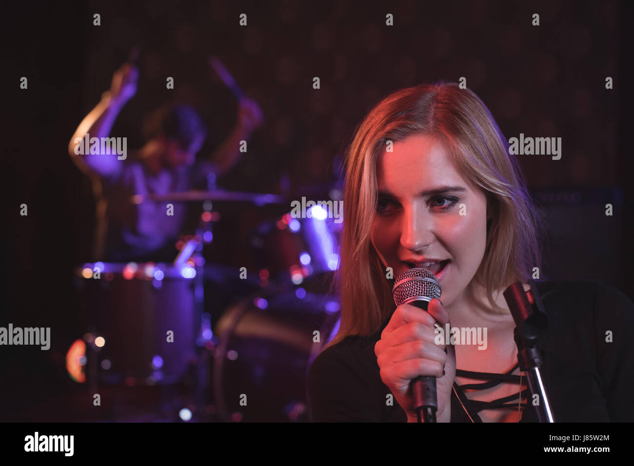 Female singer male drummer performing hi-res stock photography and ...