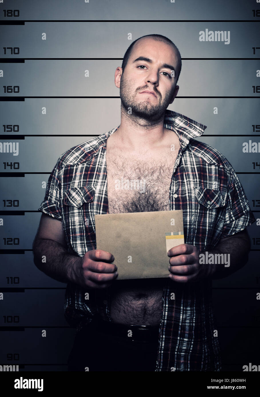 portrait raving furious angry irately criminal arrest arrested man ...