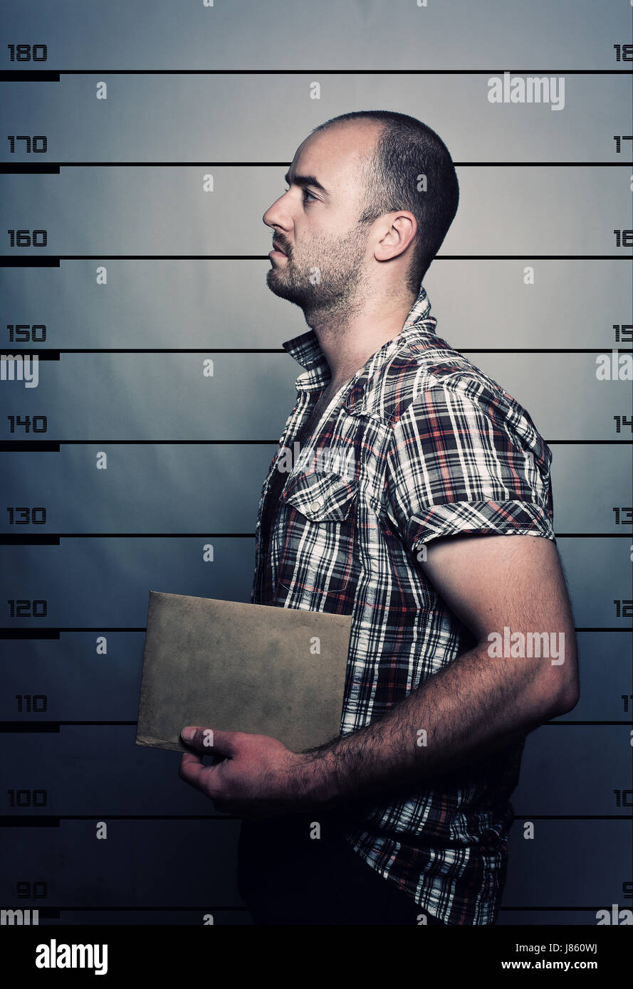 portrait raving furious angry irately criminal arrest arrested man ...