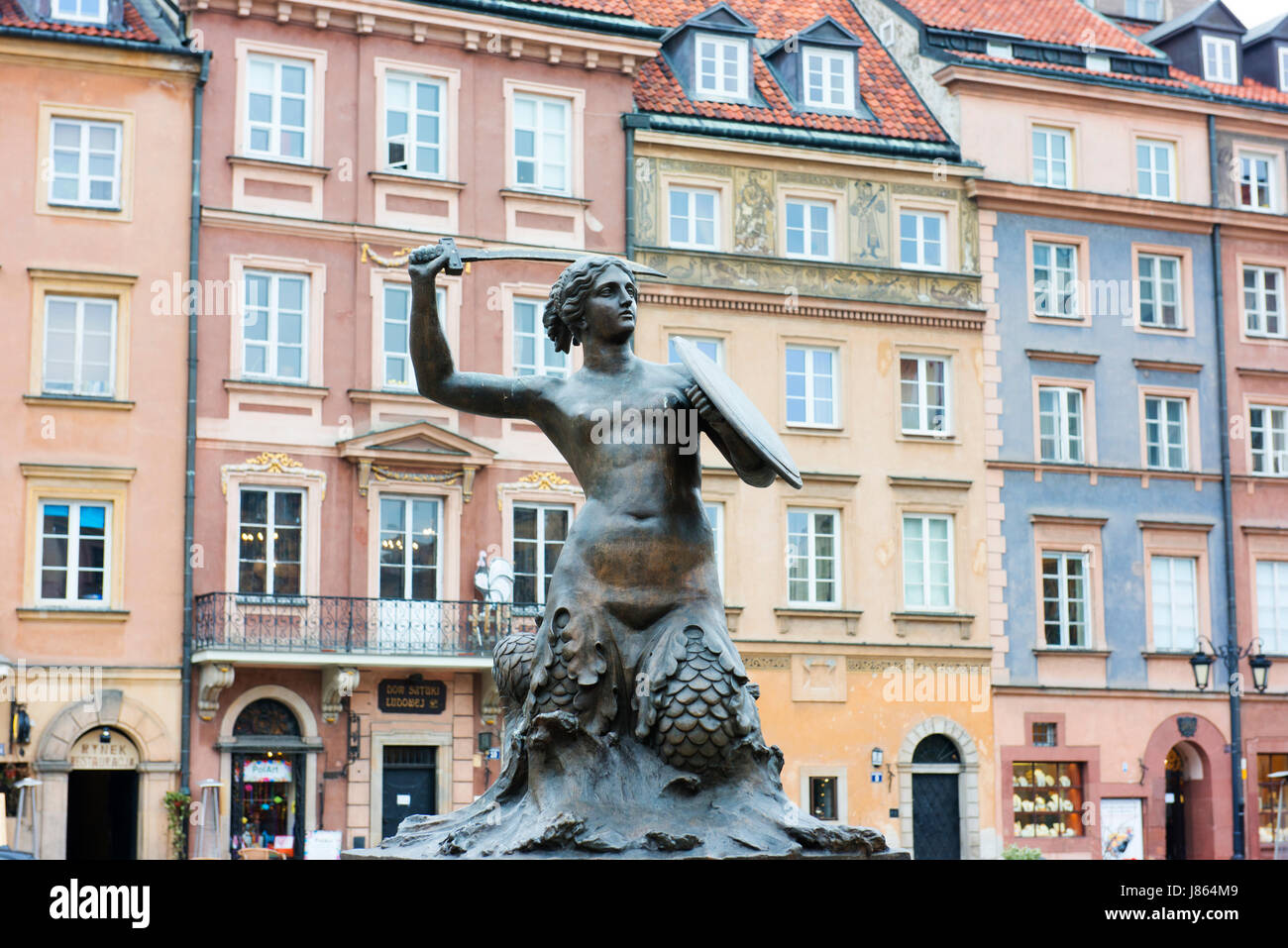 A statue of Syrenka, Warsaw's mythical mermaid who protects the city ...