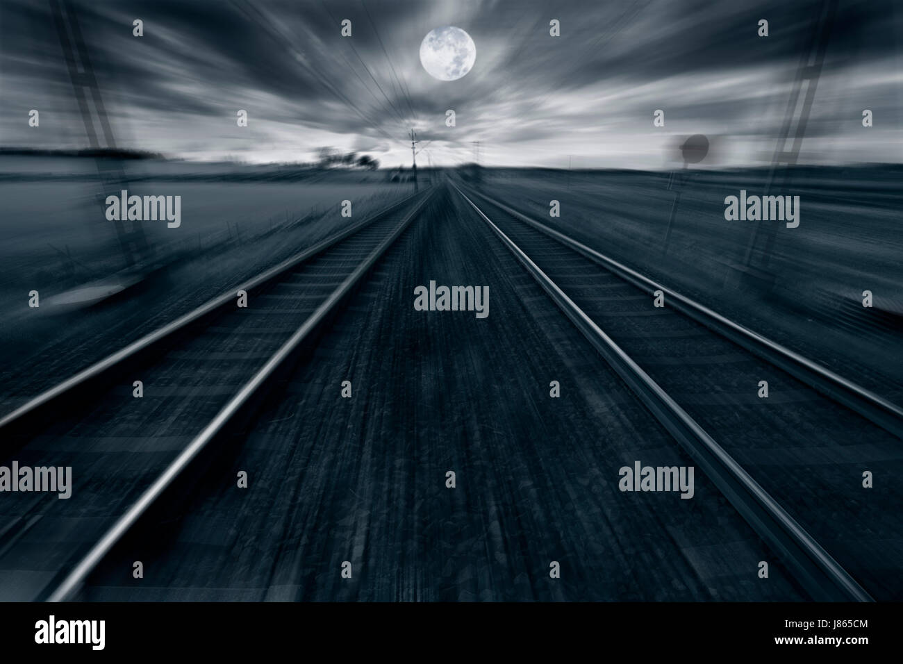 tracks moon moonlight scenery countryside nature railway locomotive train Stock Photo - Alamy