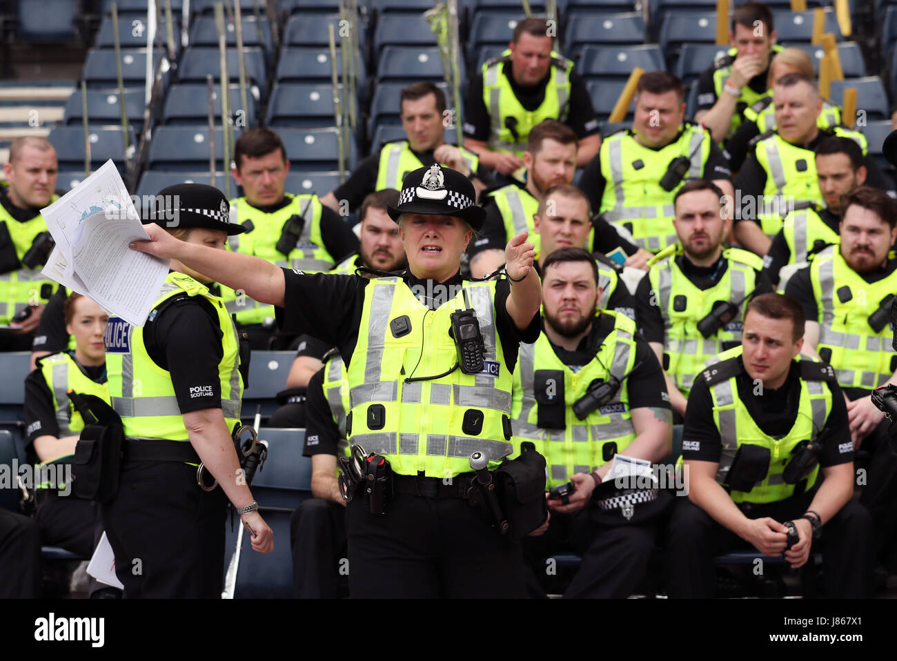 Police are briefed inside the stadium before the William Hill Scottish ...