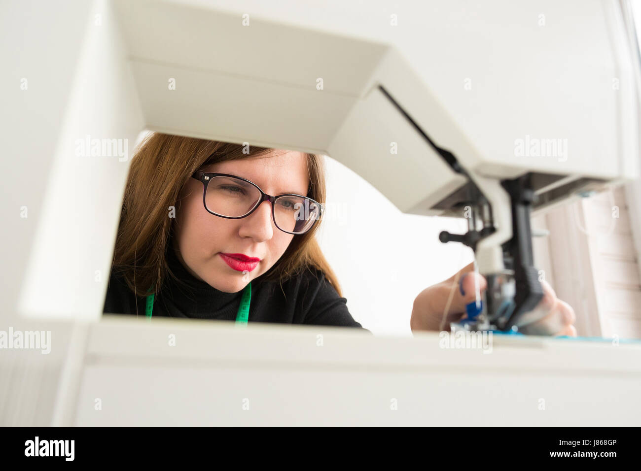 needlework and hand quilting in the workshop of a tailor - beautiful ...