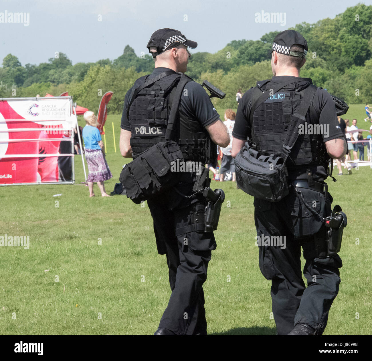 Brentwood, Essex, 27th May 2017 Armed police patrol Cancer Research ...