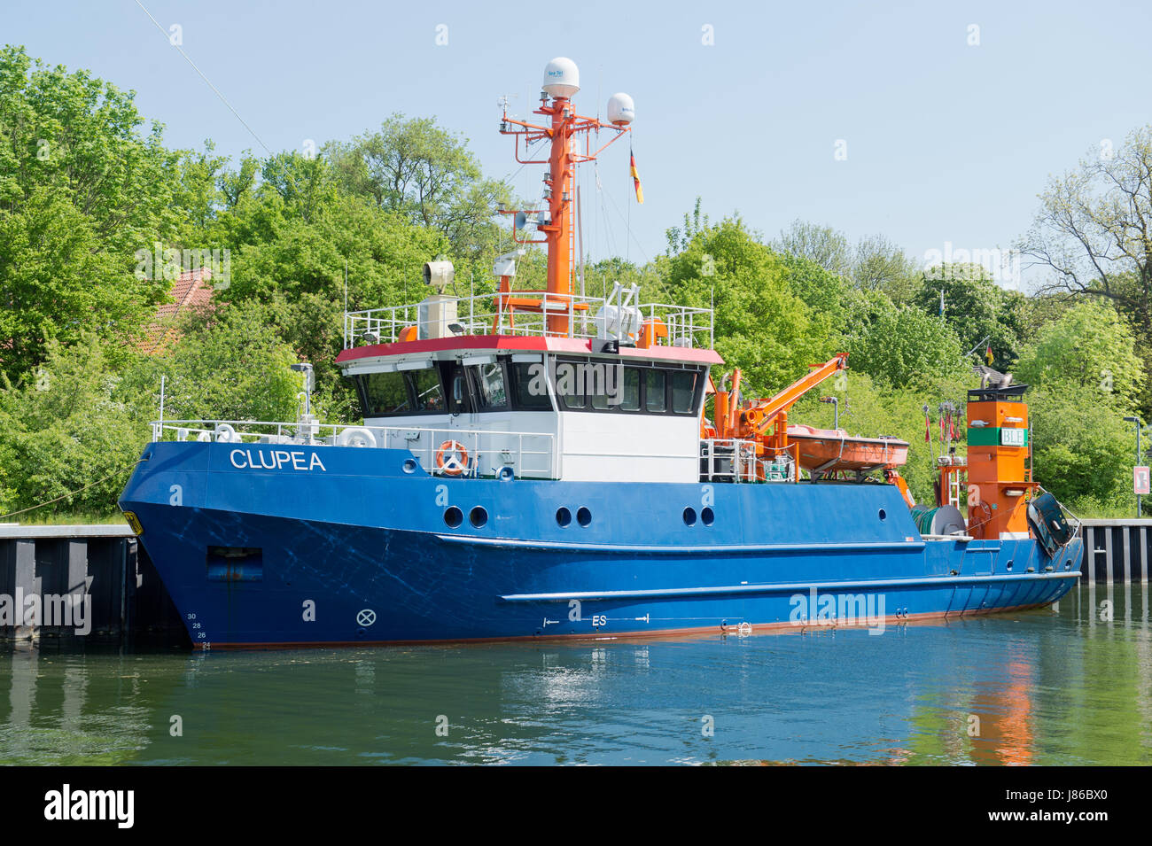 Looking at the research boat 'Clupea' at the pier in Stralsund, Germany ...