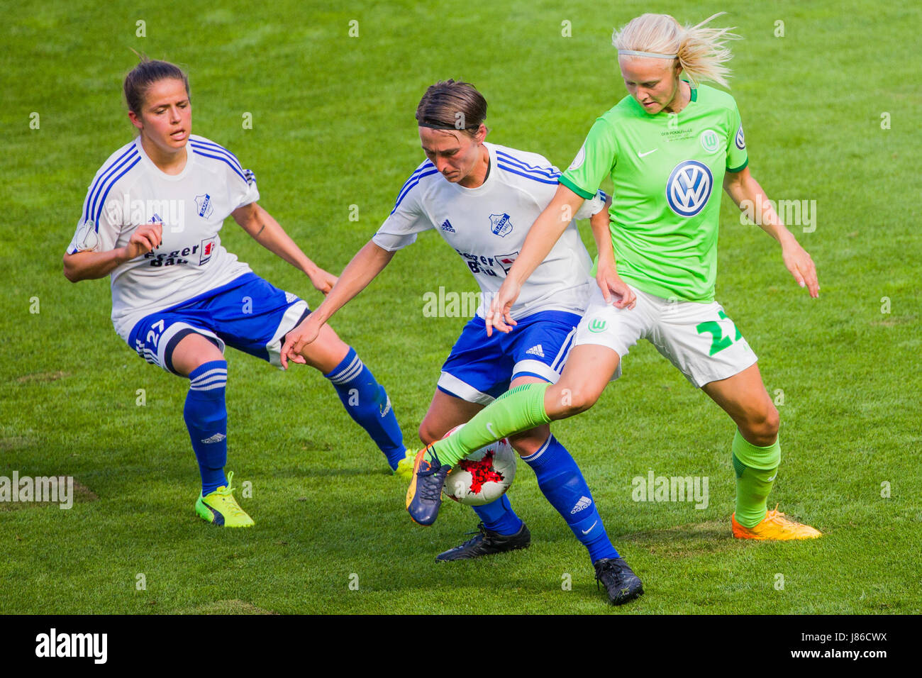 Sand's Laura Feiersinger (L-R), Anne van Bonn and Wolfburg's Pernille ...