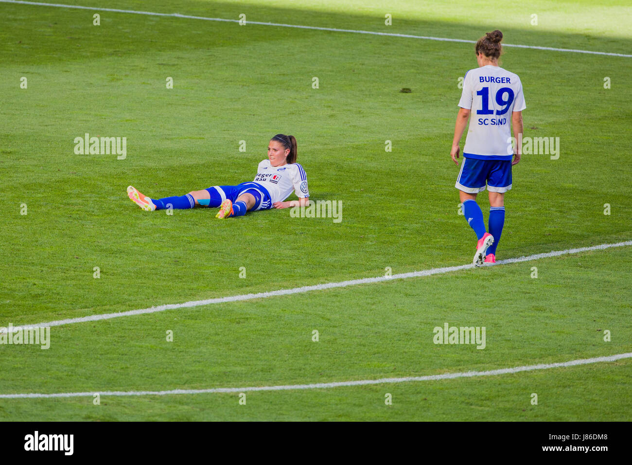 Sand's players Claire Savin (L) and Nina Burger after the ending of the ...