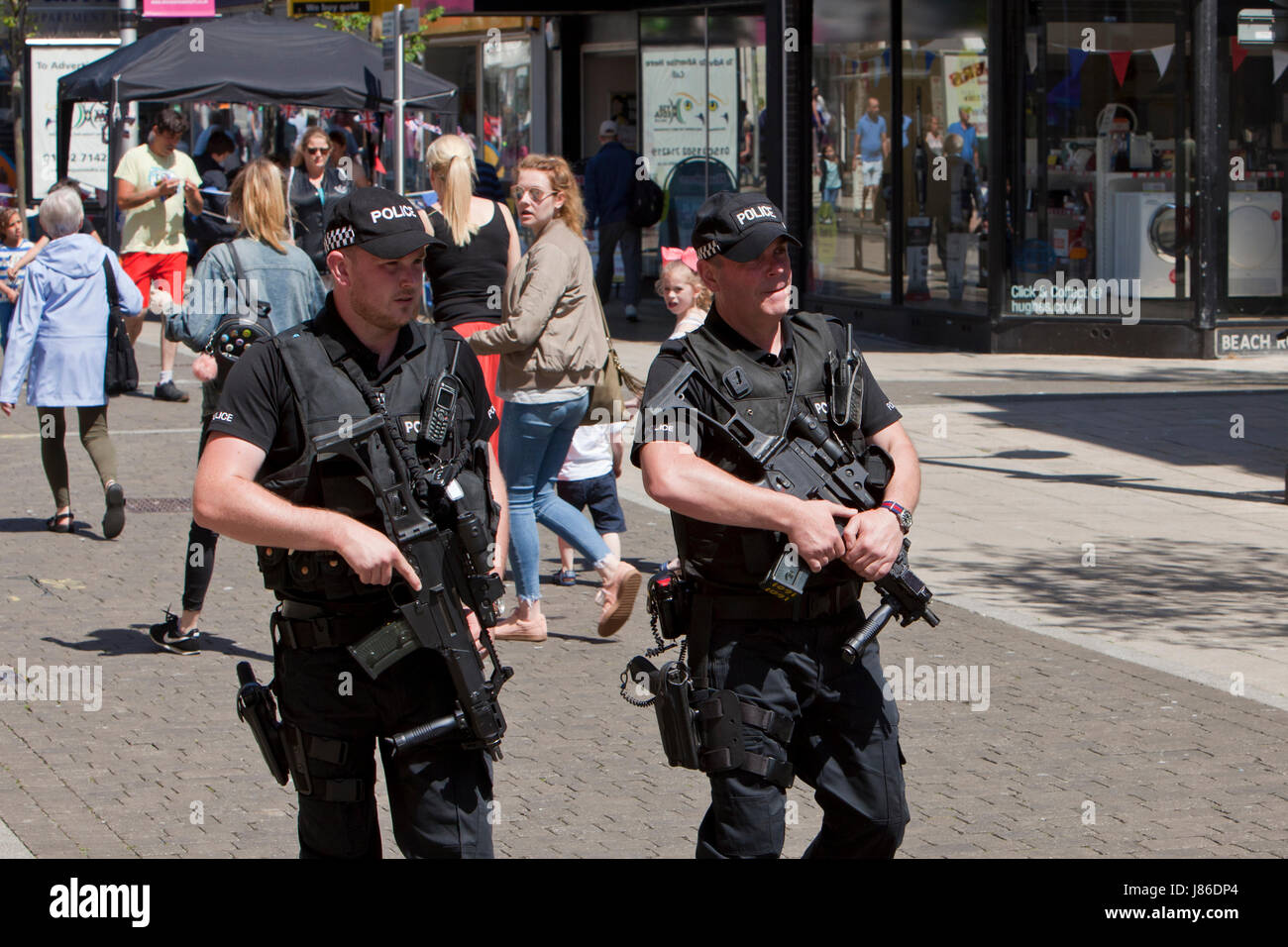 27the May 2017. Lowestfot, UK. Armed police officers a reassuring and ...