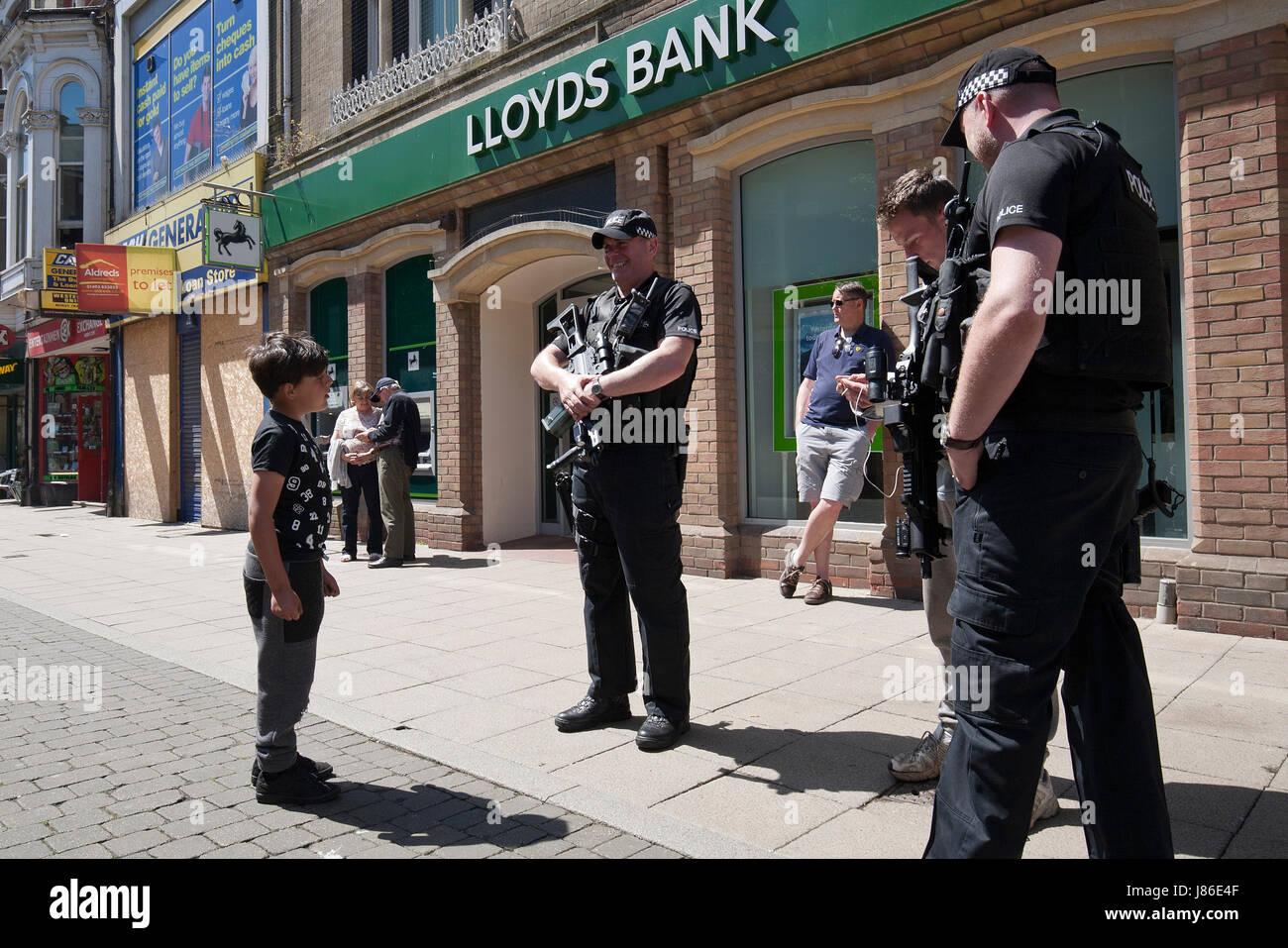 Lowestoft, UK. 24th May, 2017. Armed police officers a reassuring and ...