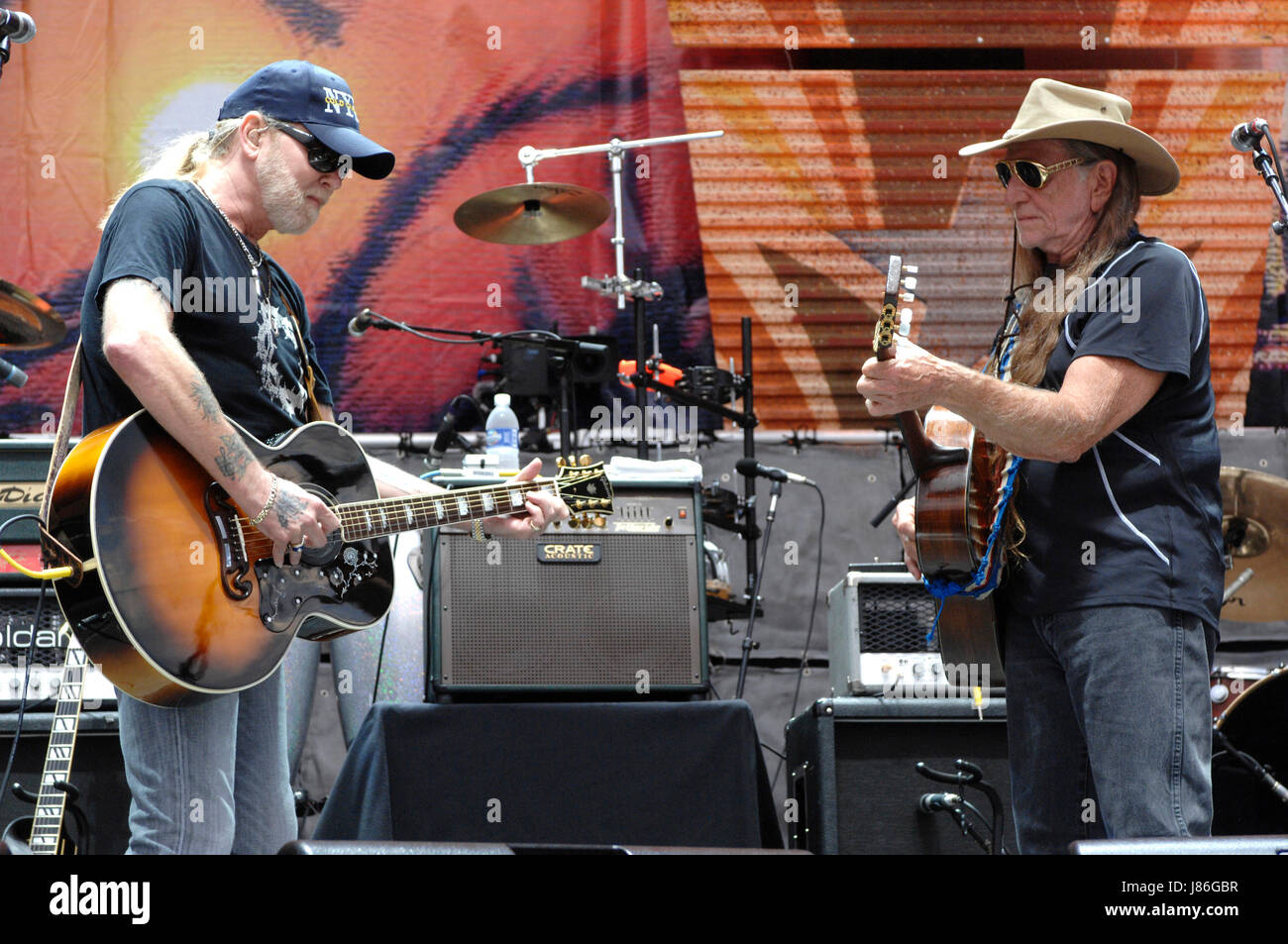 Gregg Allman performing with Willie Nelson during Farm Aid 2007 at ...