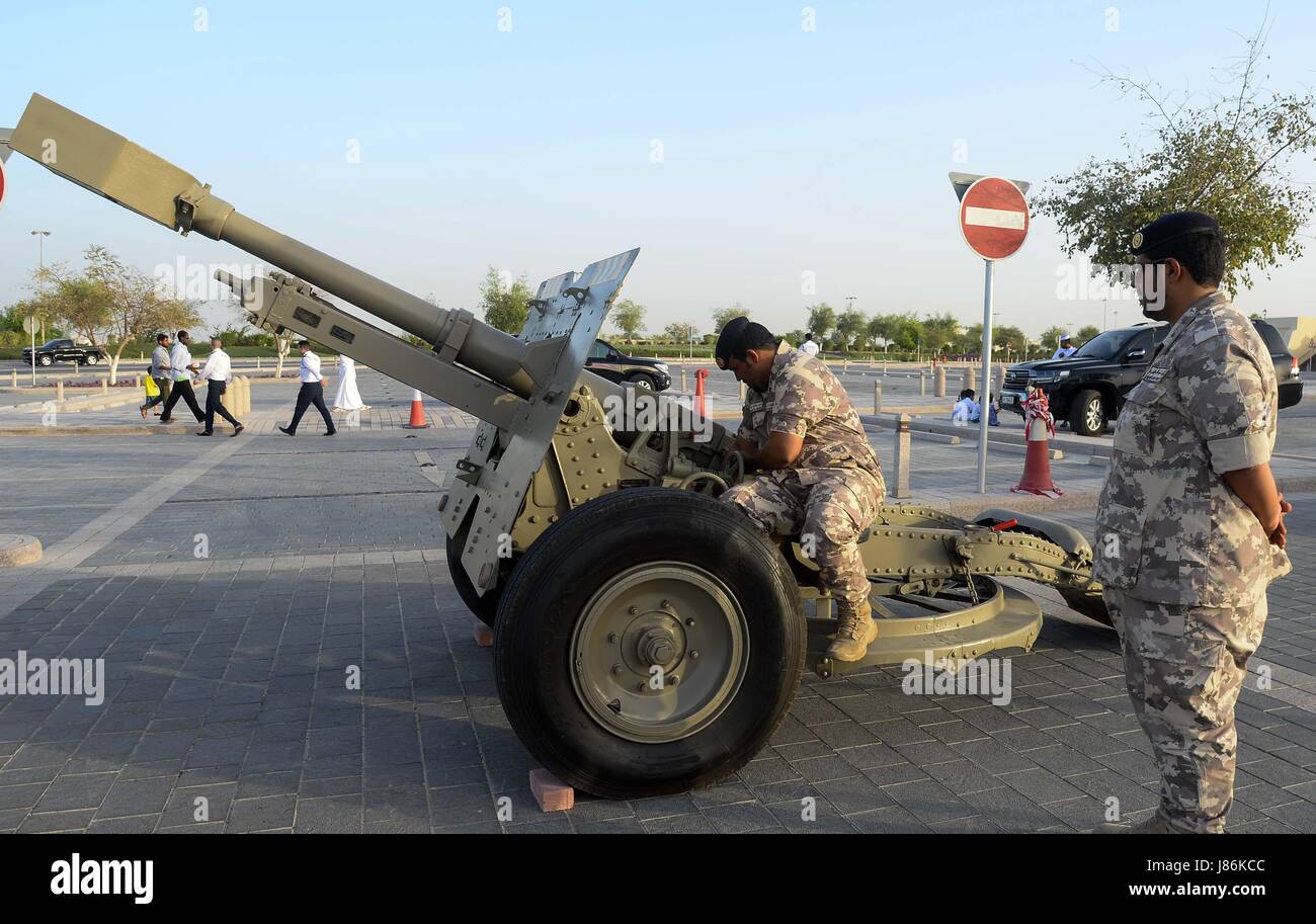 Doha. 27th May, 2017. Qatari armed forces prepare a cannon to fire ...