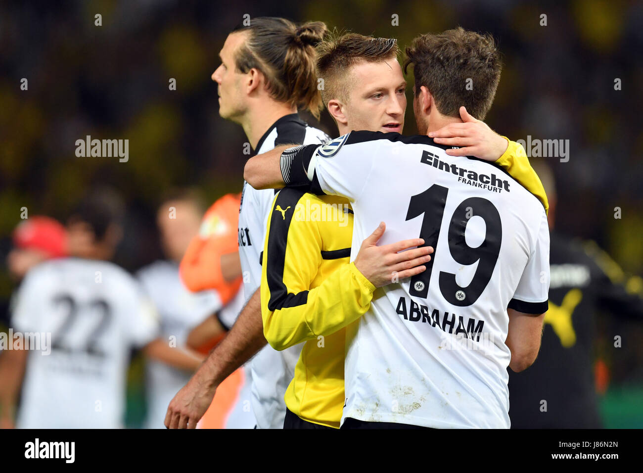 Berlin, Germany. 27th May, 2017. Dortmund's Marco Reus (C) comforts ...