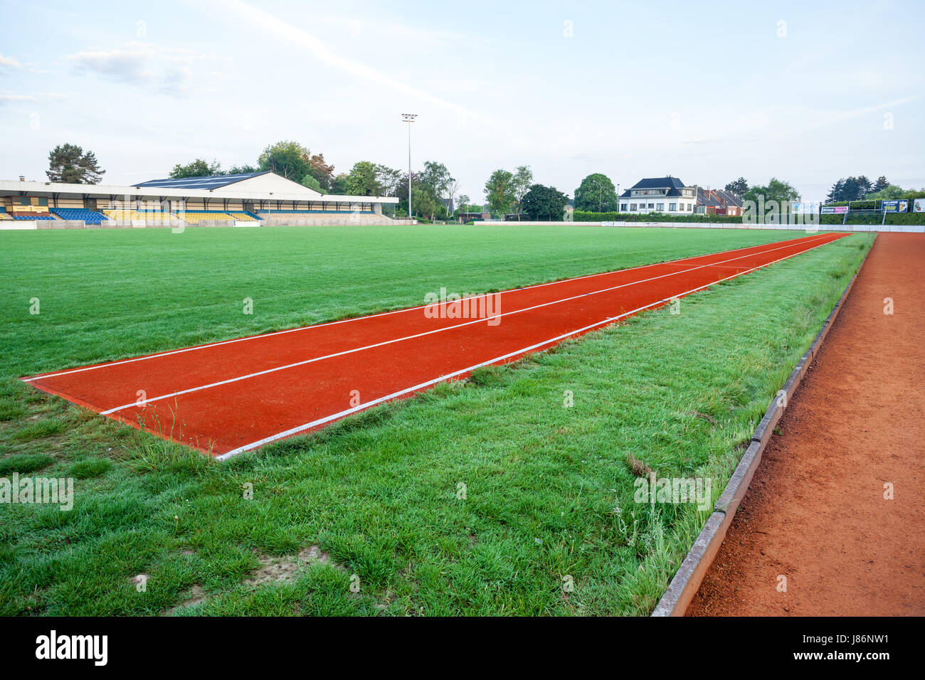An fast running track in the green grass Stock Photo - Alamy