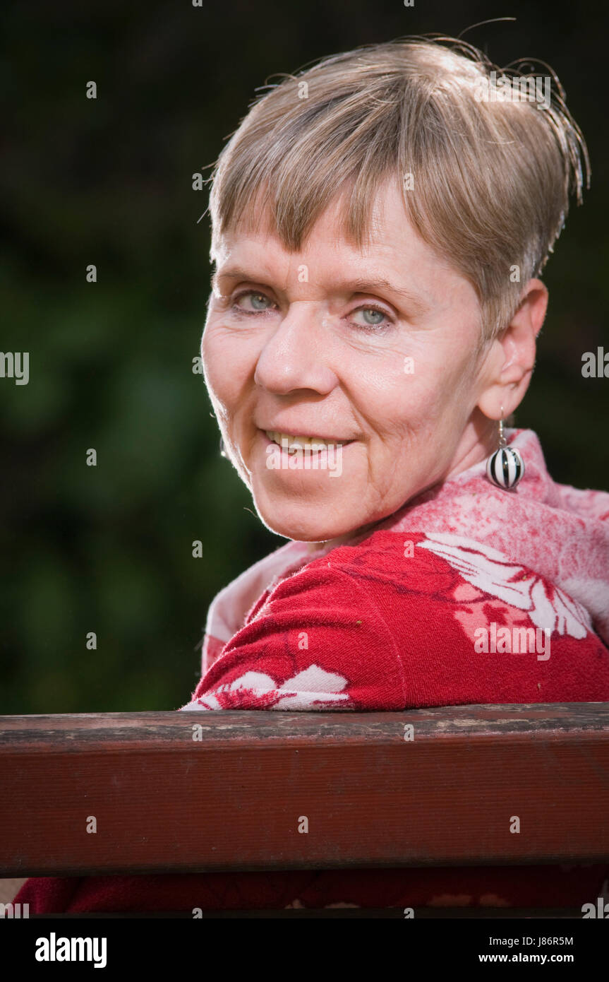 smiling on the bench Stock Photo - Alamy