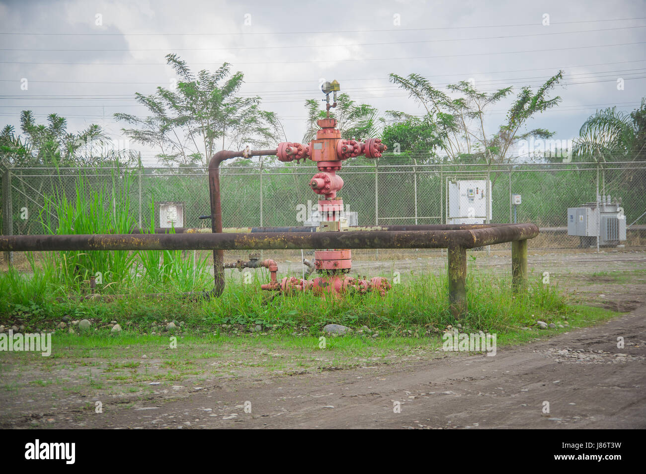 Abandoned old rusty oil rigs with preasure valve Stock Photo - Alamy