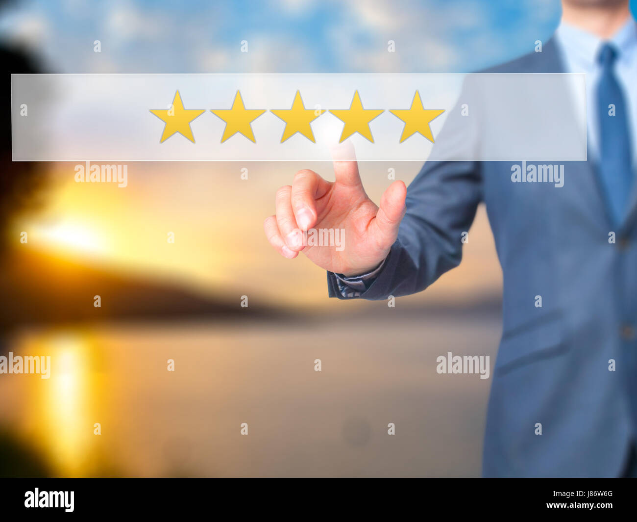 Five star rating - Businessman hand pressing button on touch screen ...