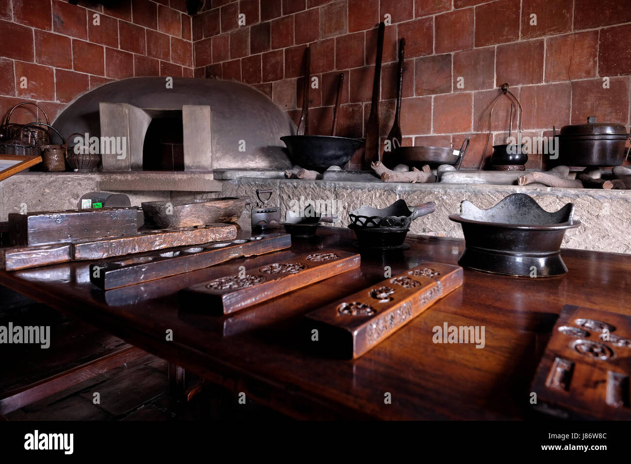 Old kitchen utensils at the kitchen of Casa Manila, containing late ...