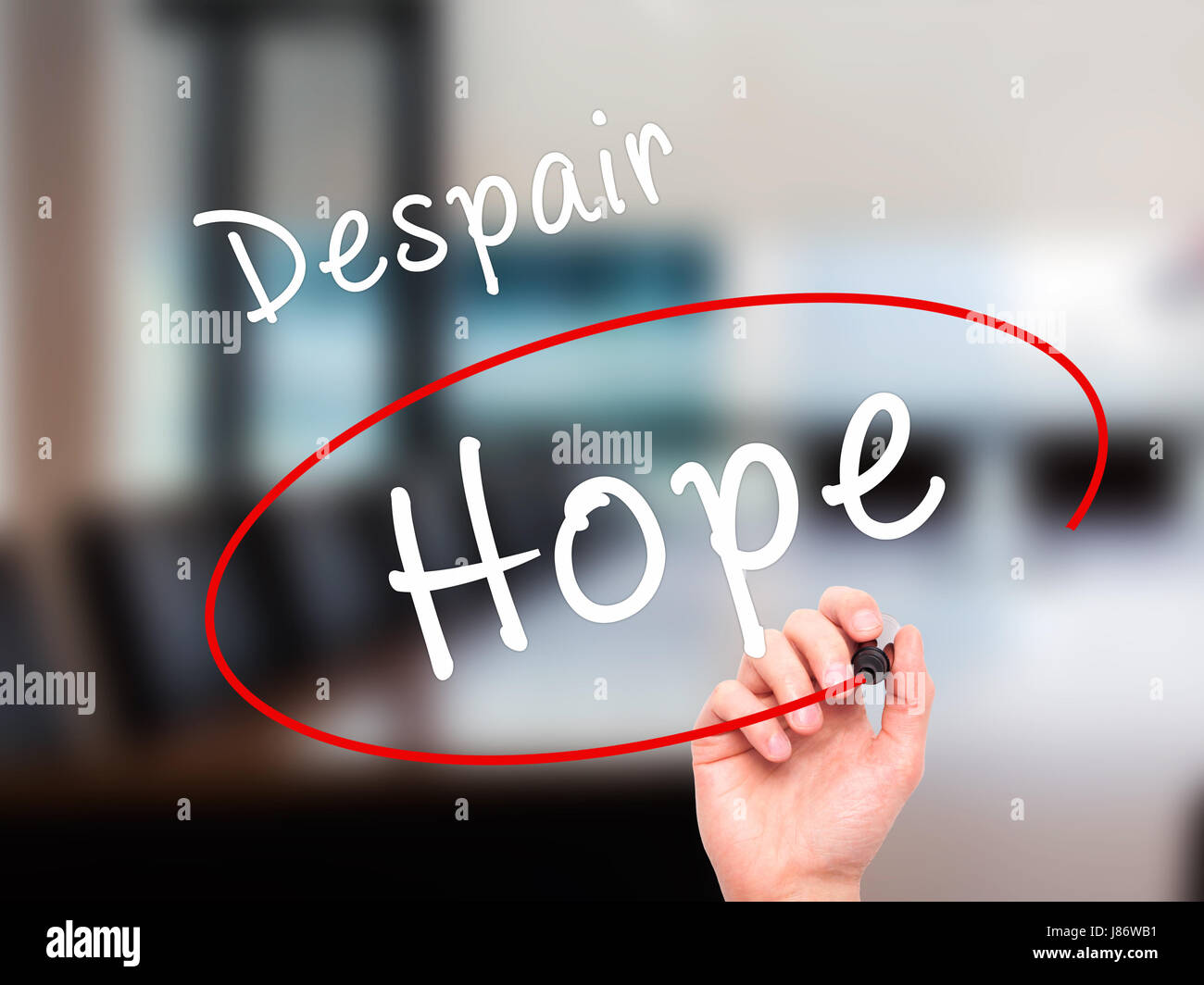 Man Hand writing and choosing Hope instead of Despair with black marker ...