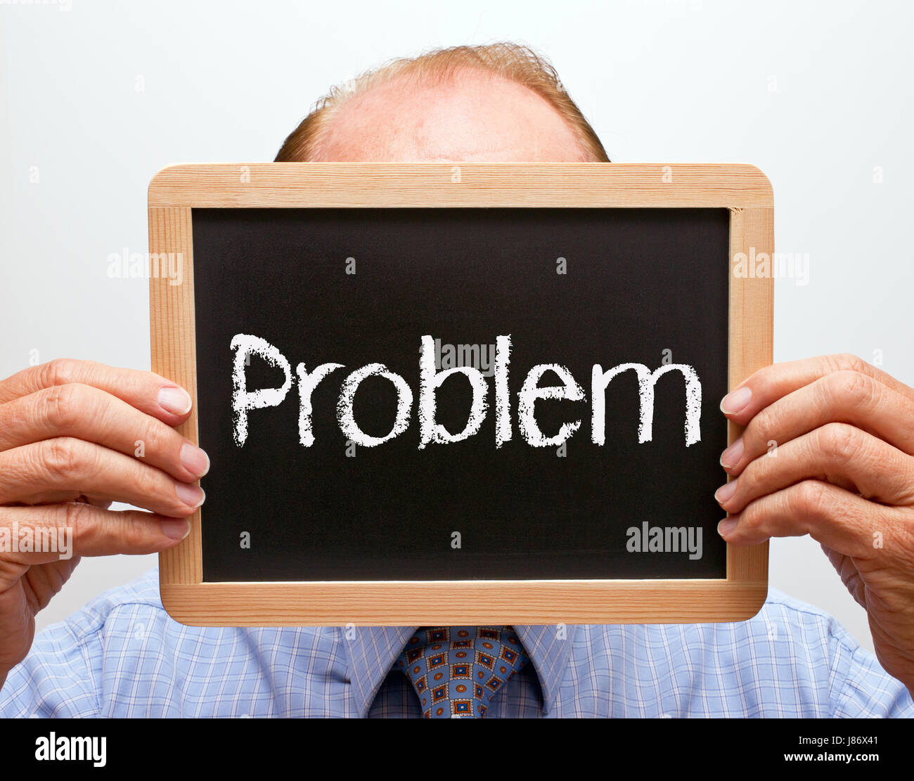 problem - man with chalkboard Stock Photo - Alamy