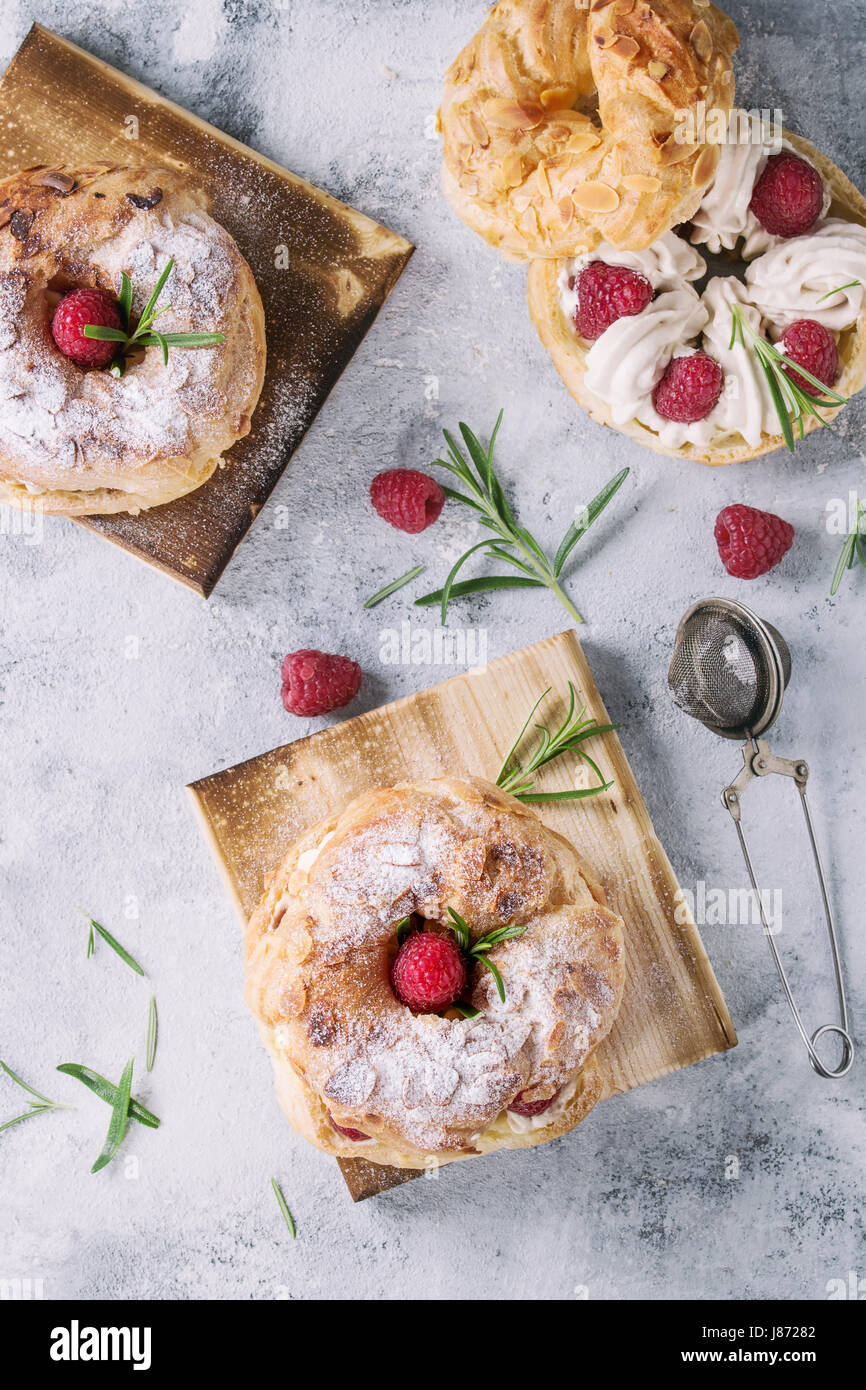 Choux cake Paris Brest with raspberries Stock Photo - Alamy
