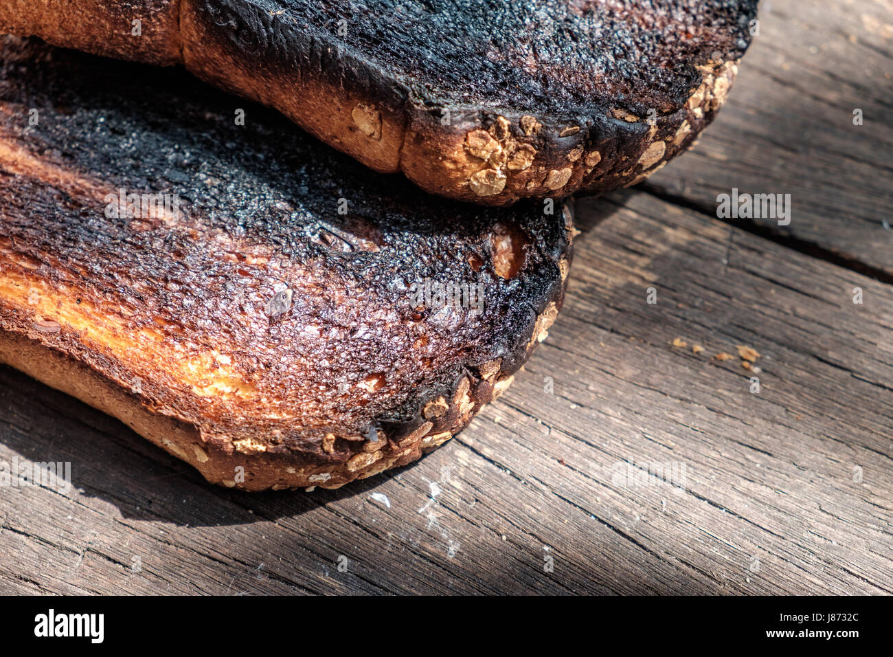 Dark burnt toast hi-res stock photography and images - Alamy
