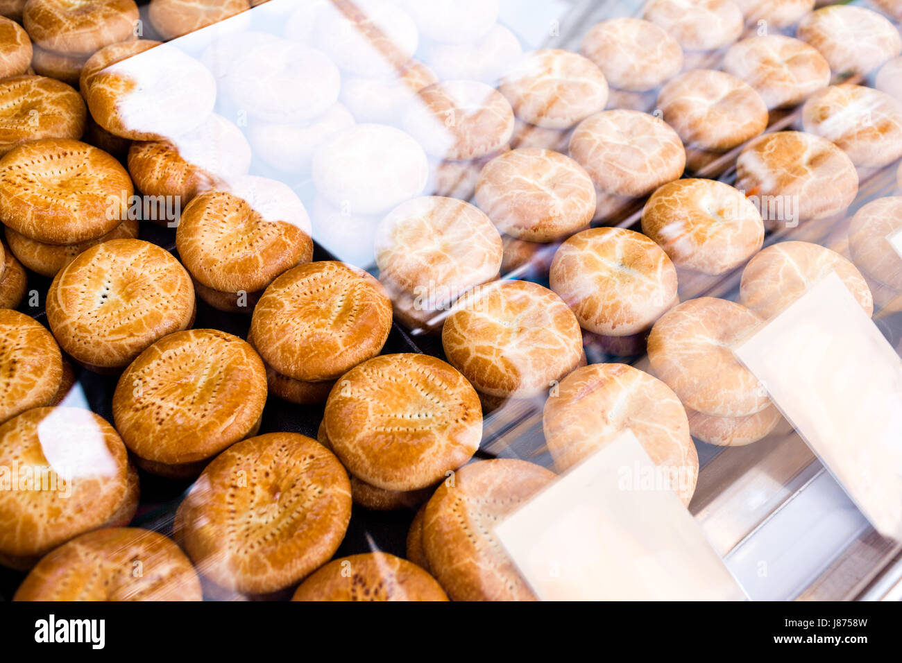 the seller gets a hand pie. home made scones display on a square. under ...