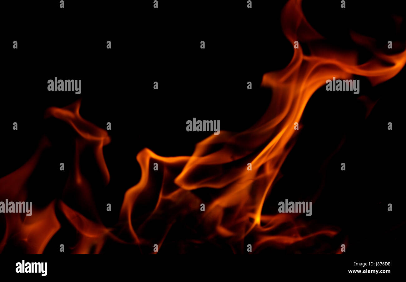 fire conflagration flame flames danger shine shines bright lucent light serene Stock Photo - Alamy