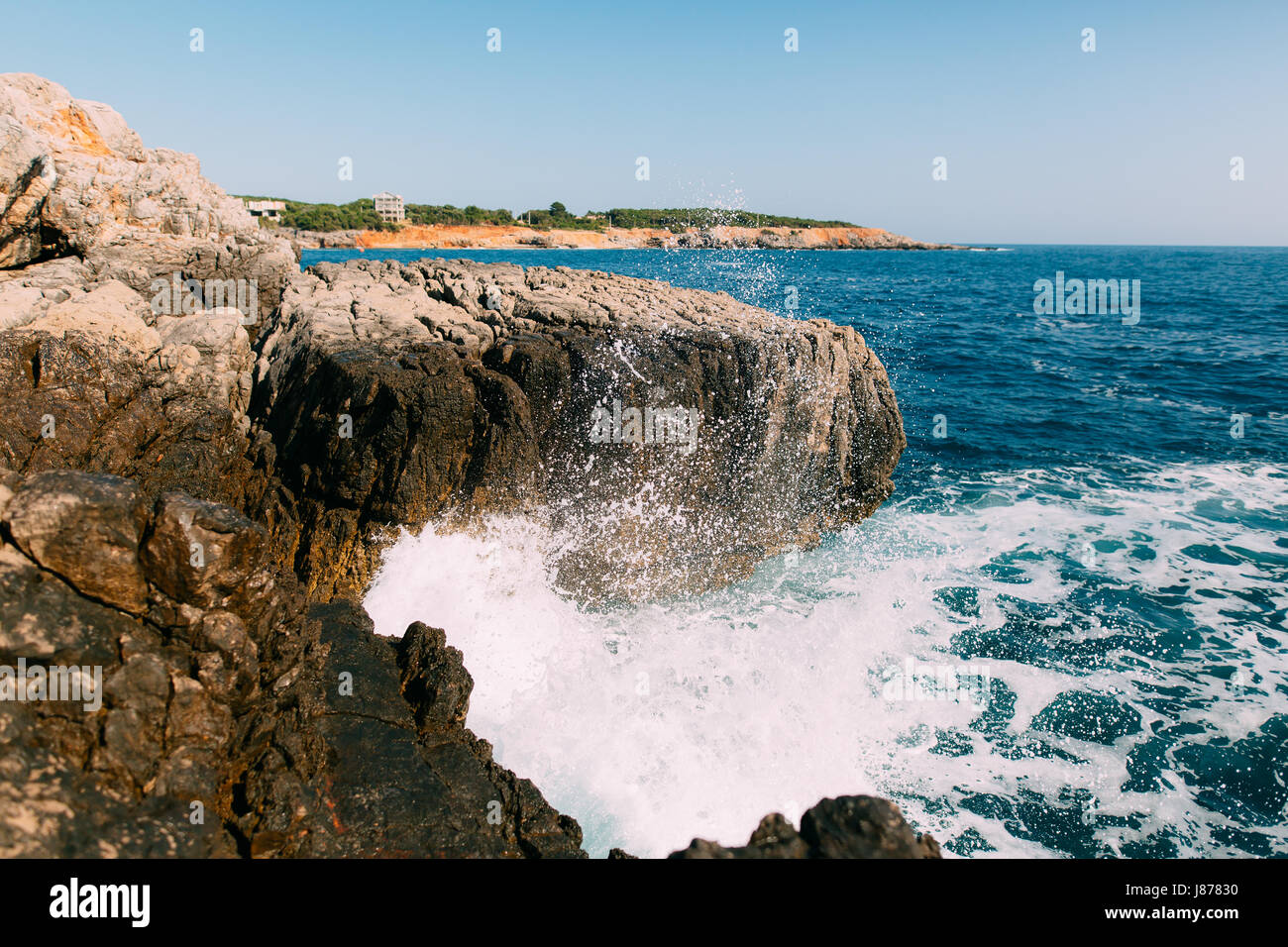 Rocks on the sea in Montenegro. Rocky coast. Wild beach. Dangerous ...