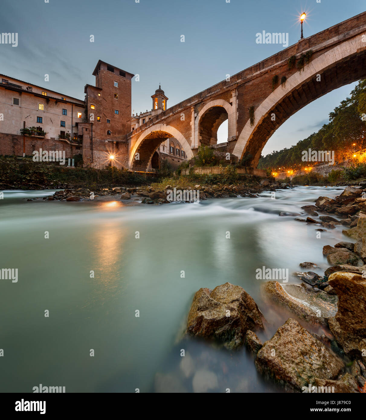 Fabricius Bridge and Tiber Island at Twilight, Rome, Italy. This is the ...