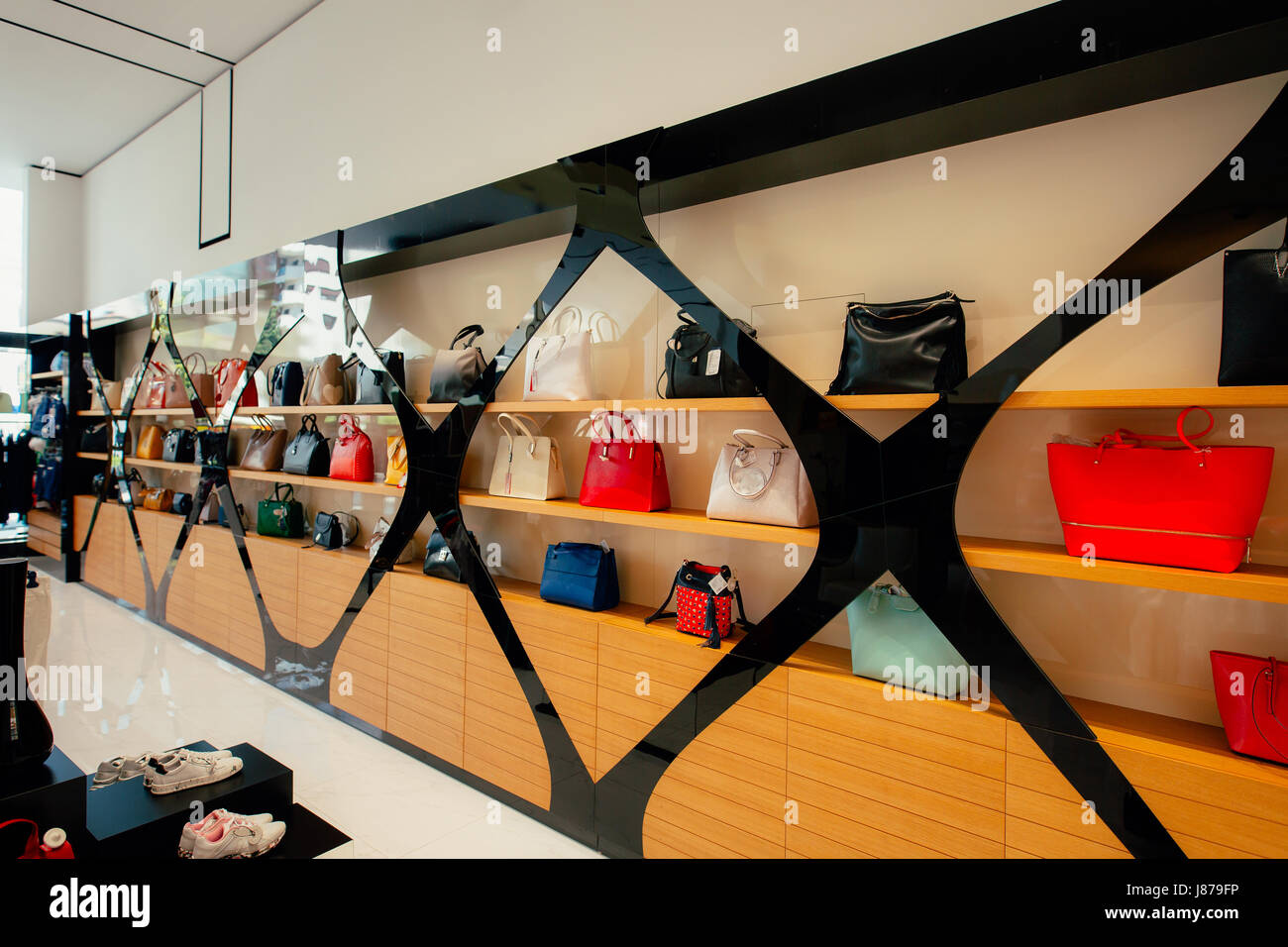 Interior of a clothing store. Clothing for men and women on the store ...