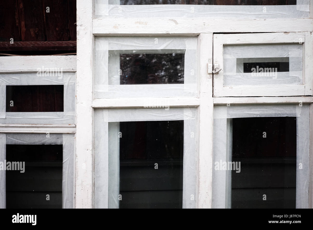 Stack of wooden windows ready for renovation, outdoor cropped shot ...