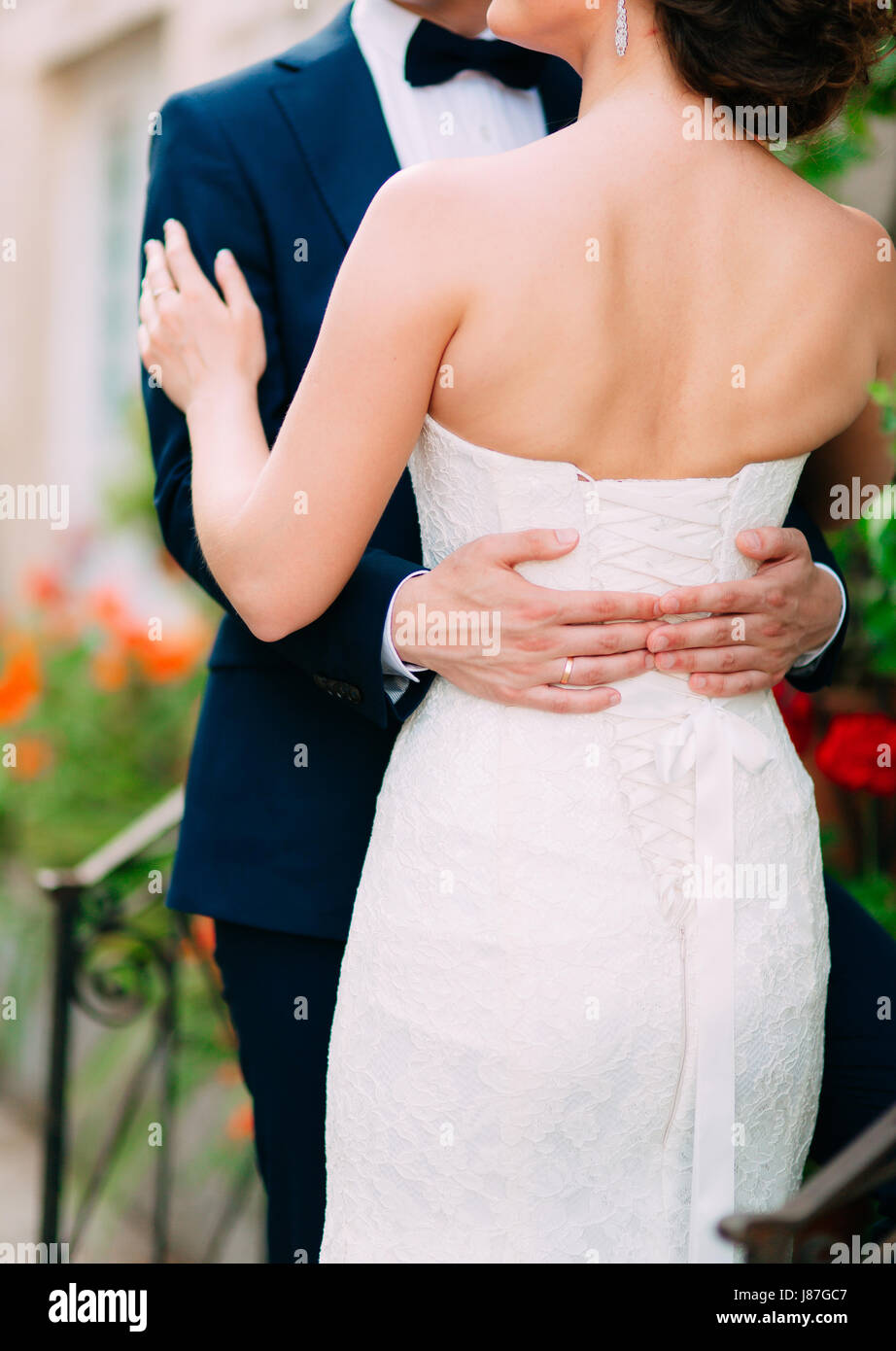 The bride is hugging the groom. Wedding in Montenegro Stock Photo - Alamy