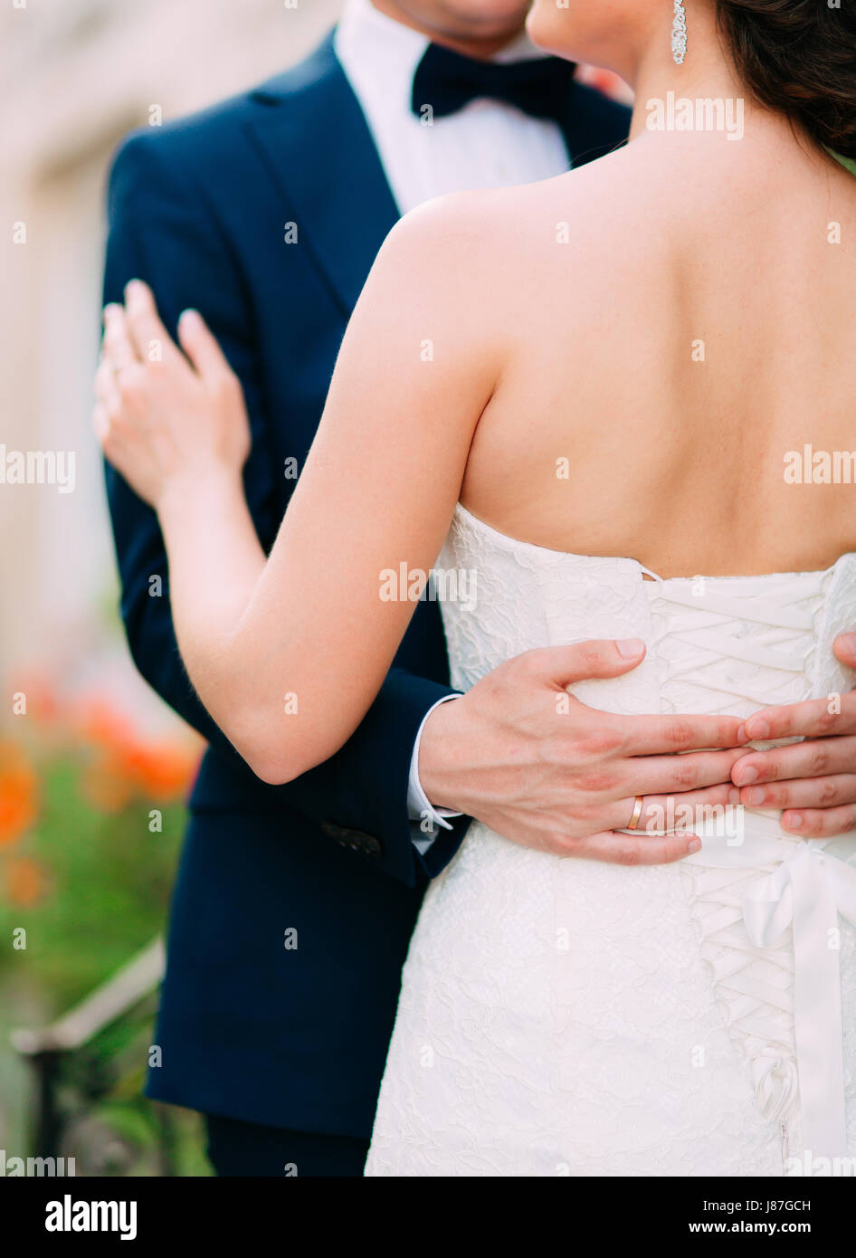 The bride is hugging the groom. Wedding in Montenegro Stock Photo - Alamy