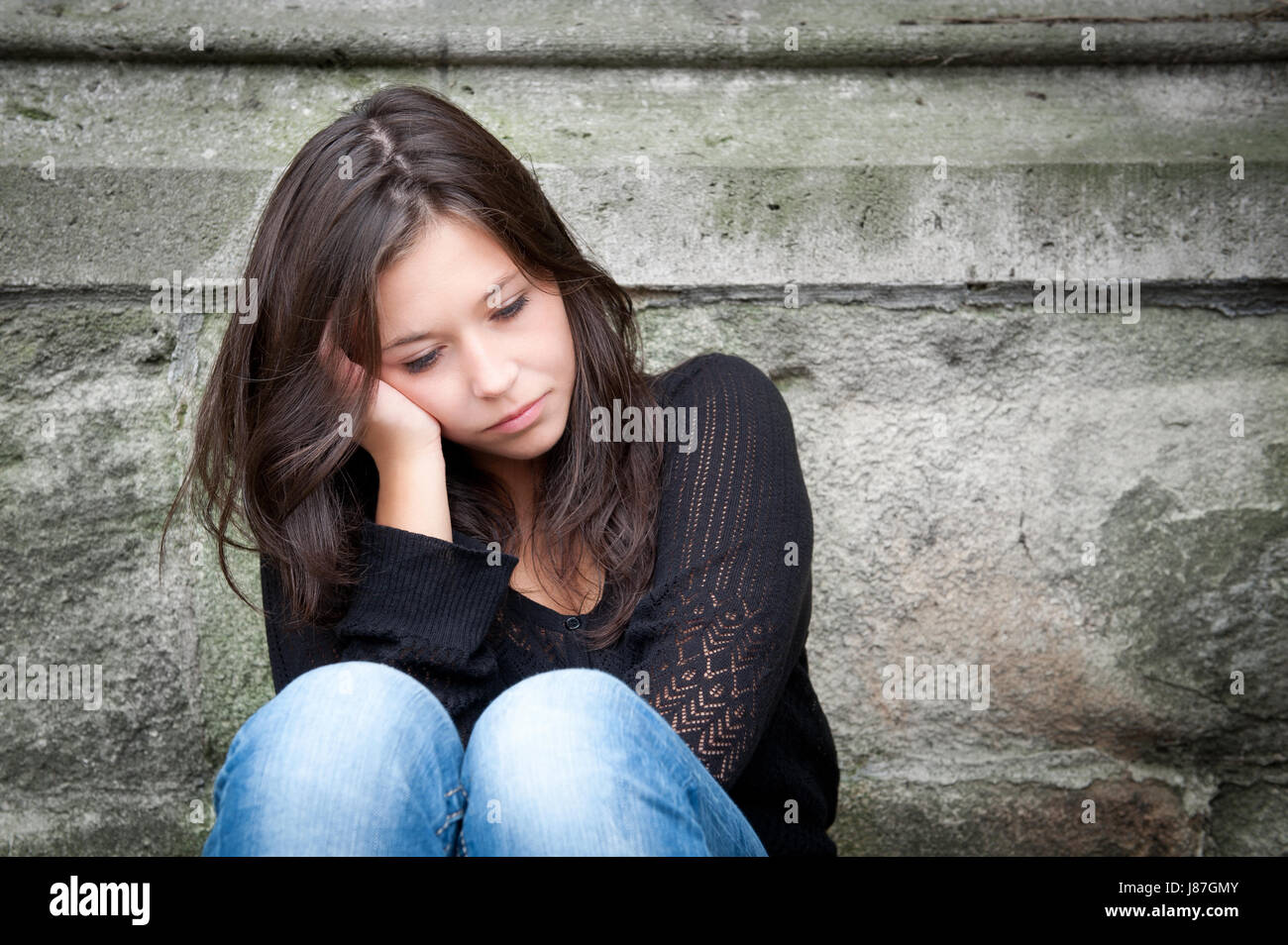 portrait of a pensive,sad girl Stock Photo - Alamy
