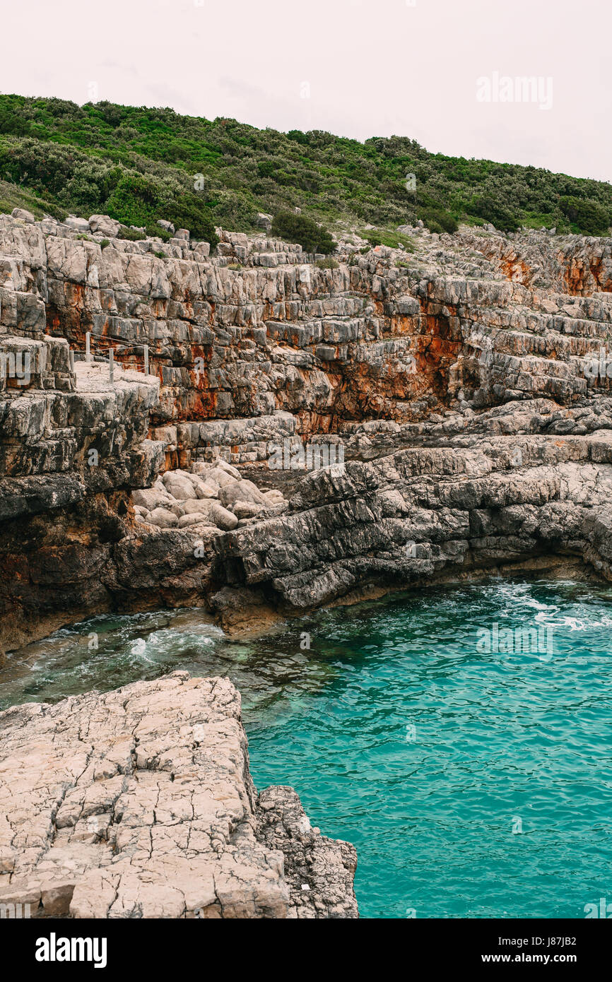 Rocks on the sea in Montenegro. Rocky coast. Wild beach. Dangerous ...