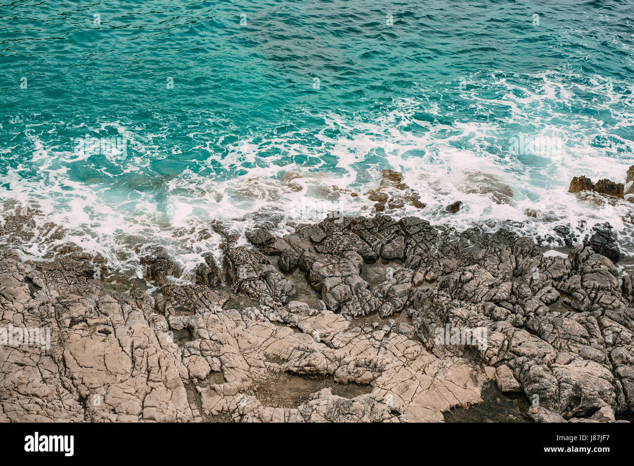 Rocks on the sea in Montenegro. Rocky coast. Wild beach. Dangerous ...