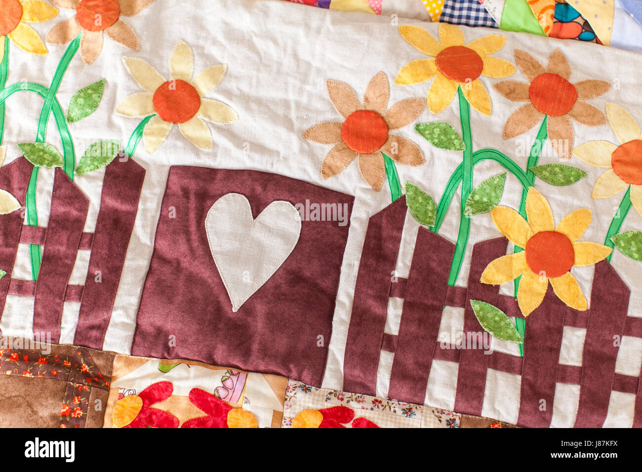 Patchwork quilt. Part of patchwork quilt as background. Handmade ...