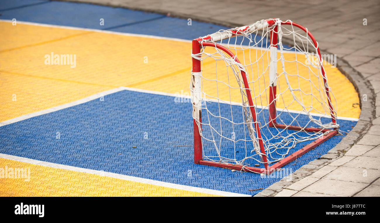 Small soccer field with mini football goal on the children playground ...