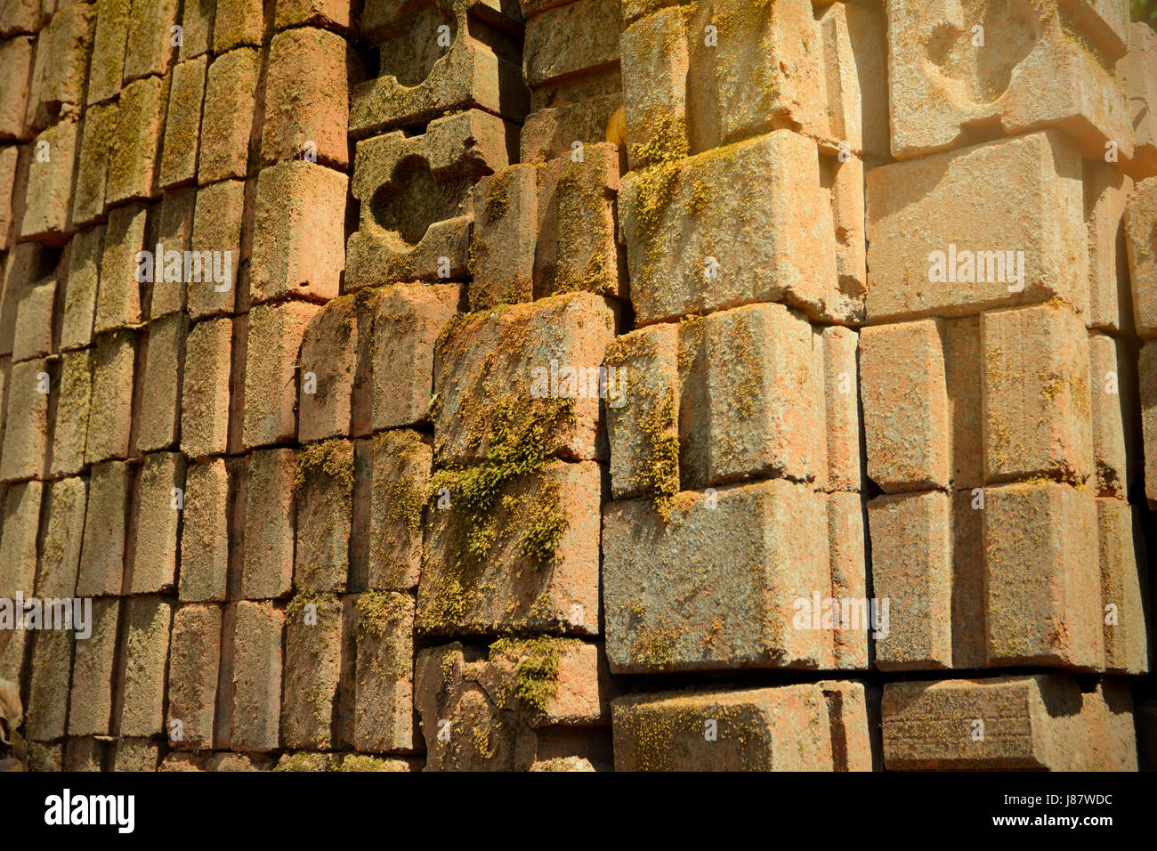 The old brick wall build by brick cube sepia style Stock Photo - Alamy