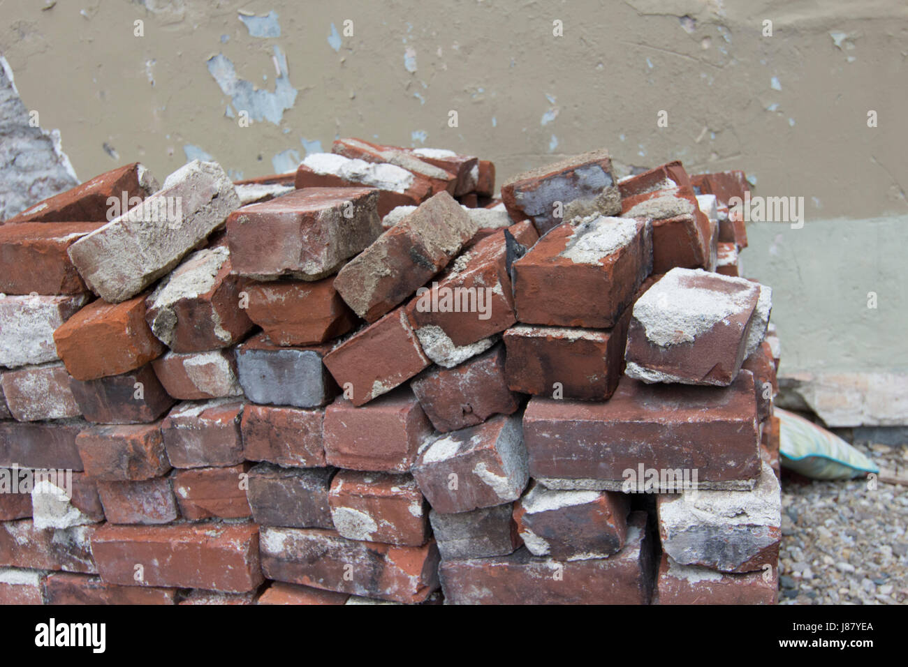 Pile of old bricks sitting on a pallet Stock Photo - Alamy
